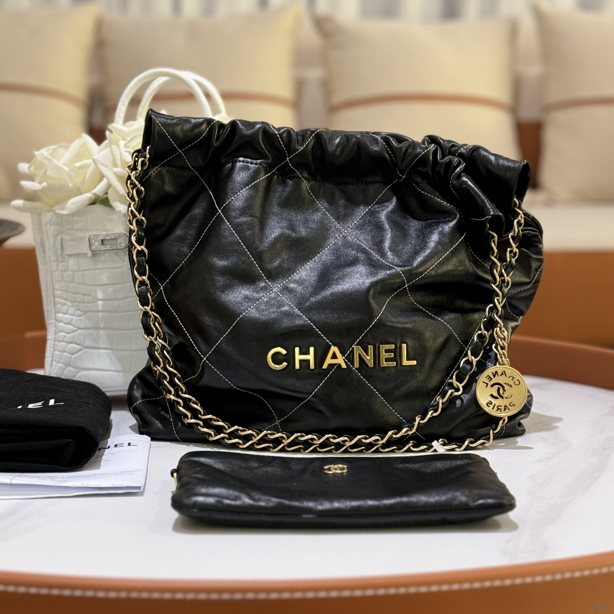CHANEL 22 BAG SMALL IN BLACK WITH WHITE STITCHING